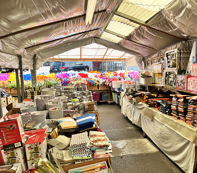 Kitchen essentials and colorful flowers create a feast for the eyes. One stop for both your tablecloth needs and the silk bouquet that never needs watering!