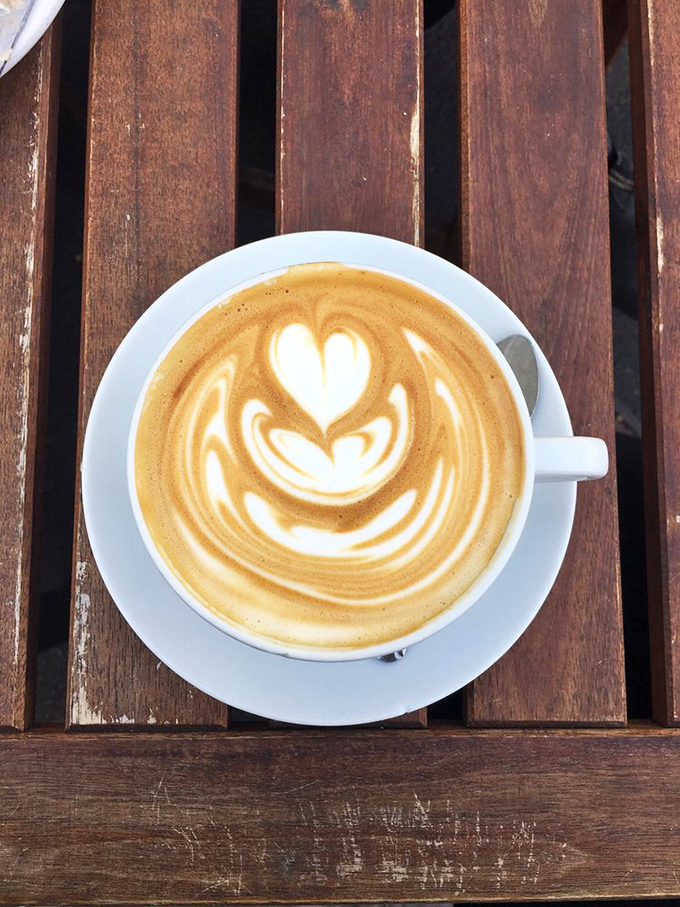 Latte art that's almost too pretty to drink – almost. Coffee this good doesn't stay photogenic for long.