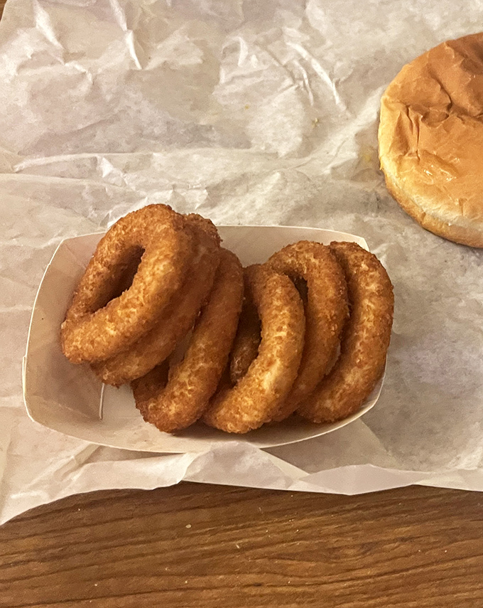 Onion rings stacked like golden halos&mdash;crispy, substantial, and without a hint of pretense. Fast food chains, take notes.