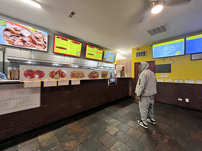 The ordering counter&mdash;where dreams begin and hunger meets its match among colorful menu boards and friendly staff.