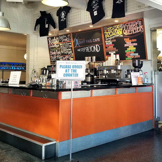 The beating heart of breakfast operations. Those colorful menu boards are like modern cave paintings telling tales of pancakes and benedicts.