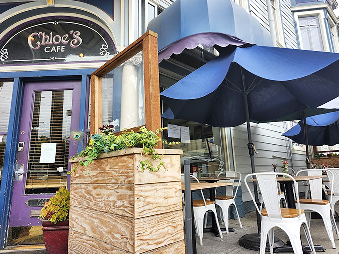Blue umbrellas and outdoor seating create an urban oasis where your only responsibility is deciding between sweet or savory breakfast options.