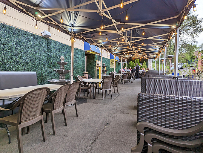 The outdoor seating area: where fresh air meets fresh flavors. String lights add just enough magic to make dinner feel like an occasion.