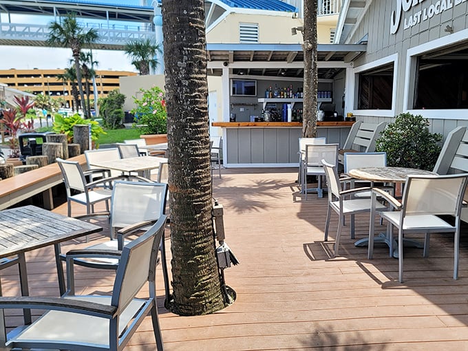 The outdoor deck where palm trees provide shade and ocean breezes provide the soundtrack to your perfectly relaxed afternoon cocktail.