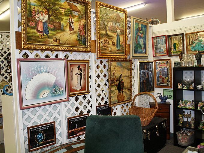 The wall where forgotten masterpieces and hotel art coexist in perfect harmony, waiting for their forever homes.