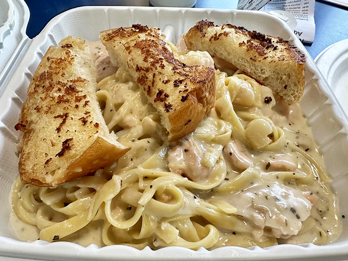 Creamy seafood pasta that doesn't apologize for its richness&mdash;comfort food that's had a promotion and now vacations on the coast.