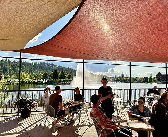 Sun-dappled outdoor dining where the fountain view competes with the food for your attention. This is what vacation memories are made of.