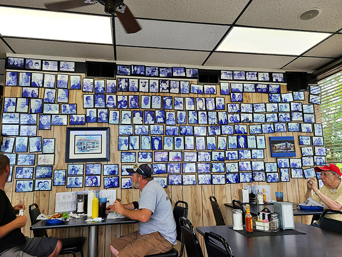 Each photo represents someone who came for breakfast but found a second home. The wall of fame that fame didn't build.