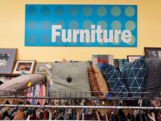 Blue signage guides you through this sea of possibilities. The furniture section waits like an island of opportunity in this bargain archipelago.