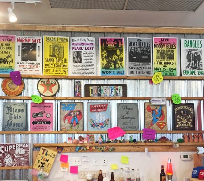 Concert posters and vintage advertisements create a time-travel wallpaper effect, proving nostalgia tastes even sweeter when properly framed.