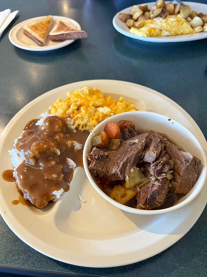 Sunday dinner any day of the week&mdash;tender pot roast with vegetables and gravy-soaked rice plus eggs that didn't need to be there but showed up anyway.