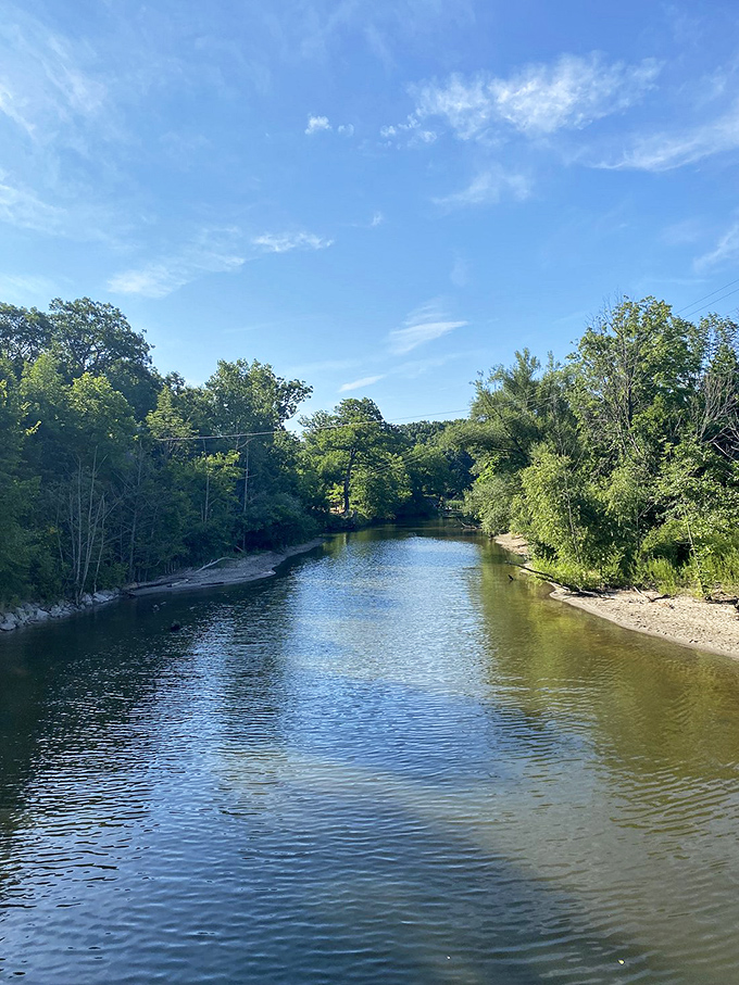 Serenity flows through Geneva State Park, where this gentle river carves its path through lush greenery, inviting kayakers and daydreamers alike.