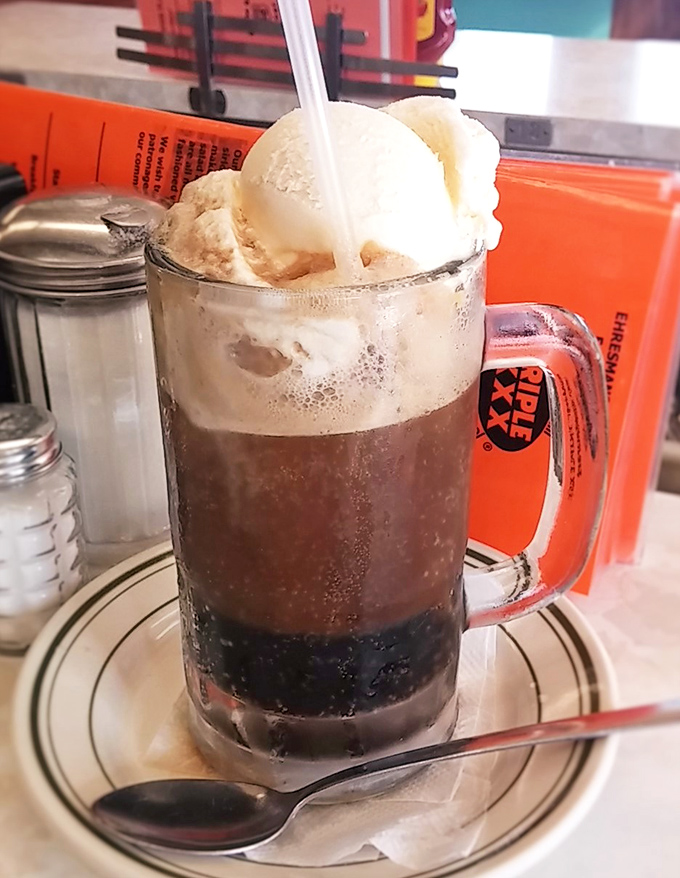 The legendary root beer float&mdash;where vanilla ice cream slowly surrenders to the soda in a frosty mug of pure nostalgic bliss.
