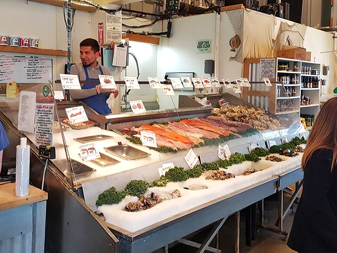 The seafood counter displays ocean treasures like a museum of edible art&mdash;each filet and shellfish arranged with gallery-worthy precision.