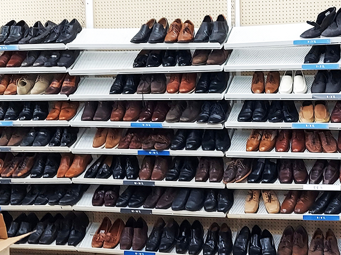 The men's dress shoe lineup looks like a corporate board meeting frozen in time. Each pair silently competing for the chance to attend your next wedding.