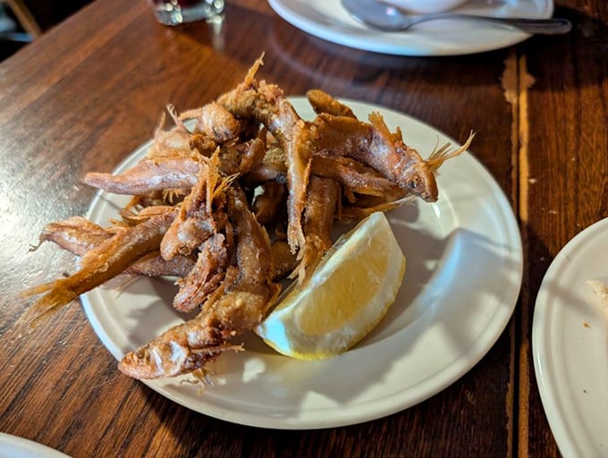 Fried smelt that's crispy, golden, and proof that sometimes the simplest preparations create the most memorable moments.