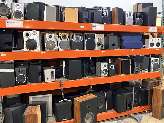 The speaker wall &ndash; audio equipment spanning decades, from "this powered my college dorm parties" to "I have no idea what this connects to anymore."