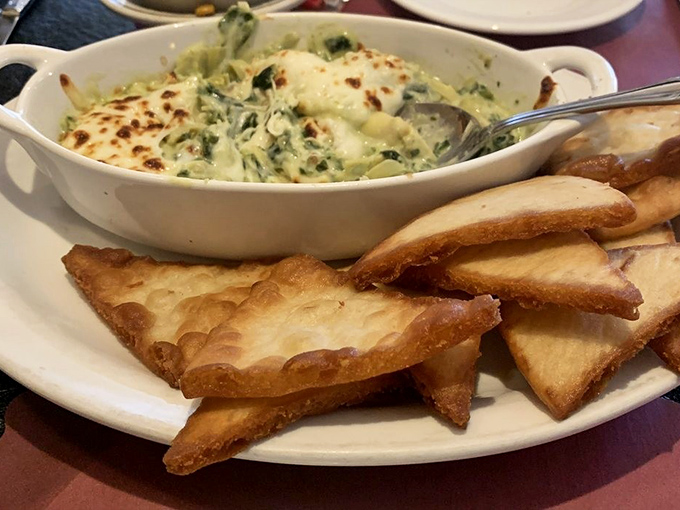 This bubbling spinach and artichoke dip isn't just an appetizer&mdash;it's a warm, cheesy commitment to starting your meal right.