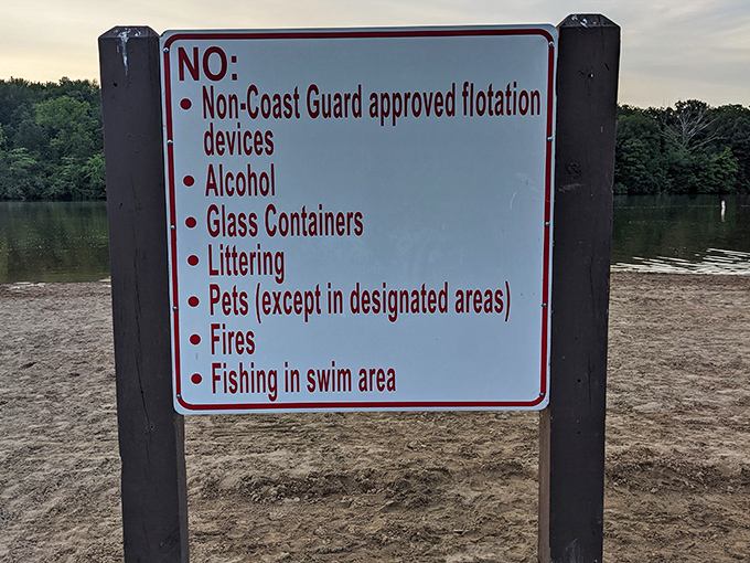 The party pooper of park signs. Every paradise needs its rules, but the lake beyond this list of "nos" offers enough "yeses" to more than compensate.