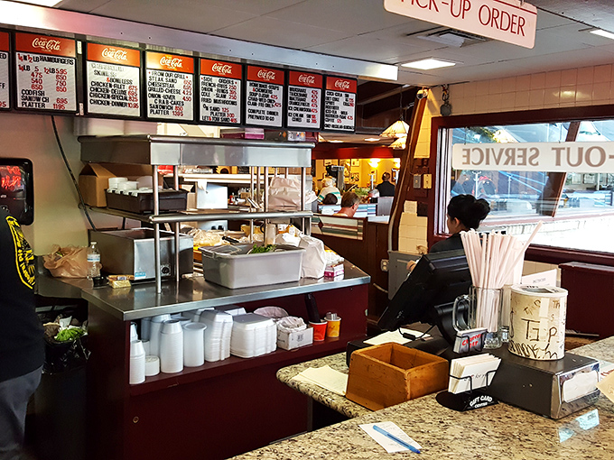 Where the magic happens: order screens glowing with possibilities and staff ready to turn your hunger into happiness.