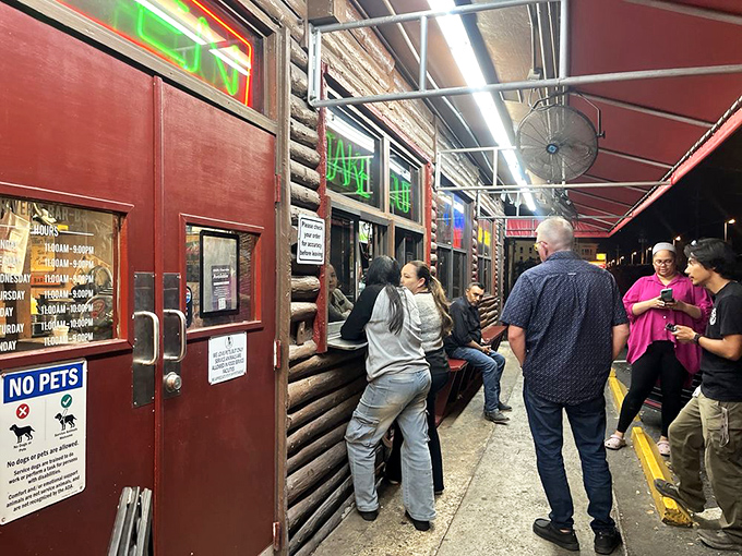 The takeout window where patience is rewarded with packages of joy &ndash; proof that good things come to those who wait.