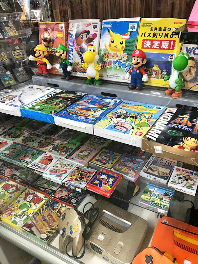 Nintendo nostalgia nirvana! Mario and friends stand guard over the games that defined generations of button-mashing memories.