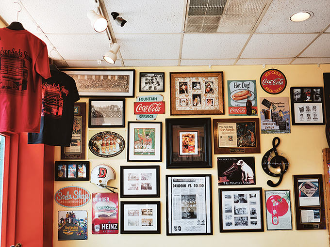 Every frame on this wall tells a story—not just of The Soda Shop, but of a community that gathers, celebrates, and returns again and again.