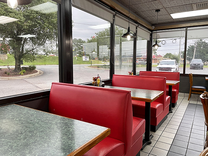 Window seats: where people-watching meets pancake-eating in perfect harmony. Red vinyl booths that have cradled countless conversations.