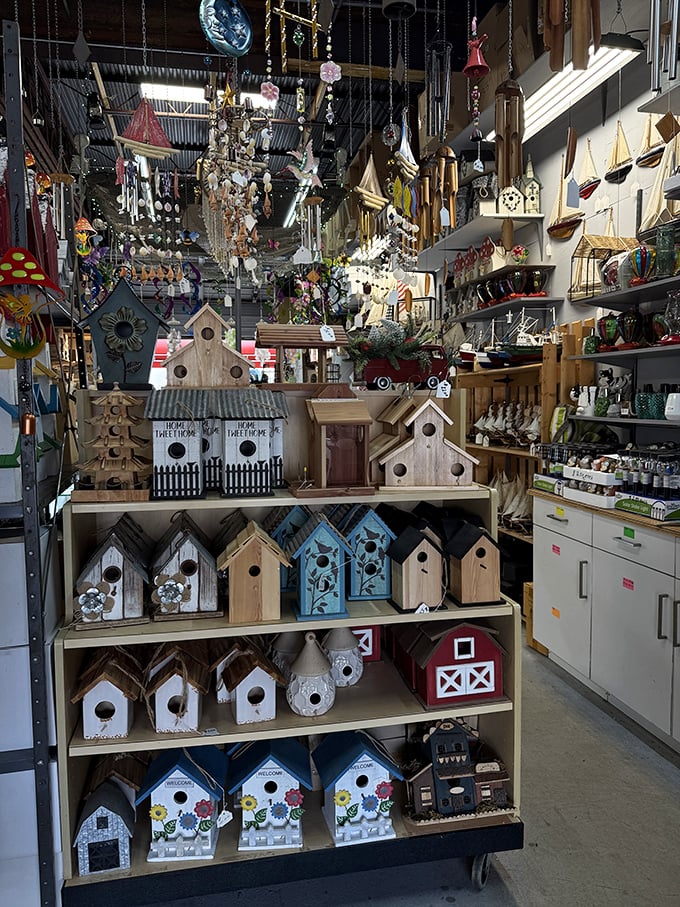 Handcrafted birdhouses and charming d&eacute;cor pieces turn this booth into a whimsical shopper&rsquo;s delight.