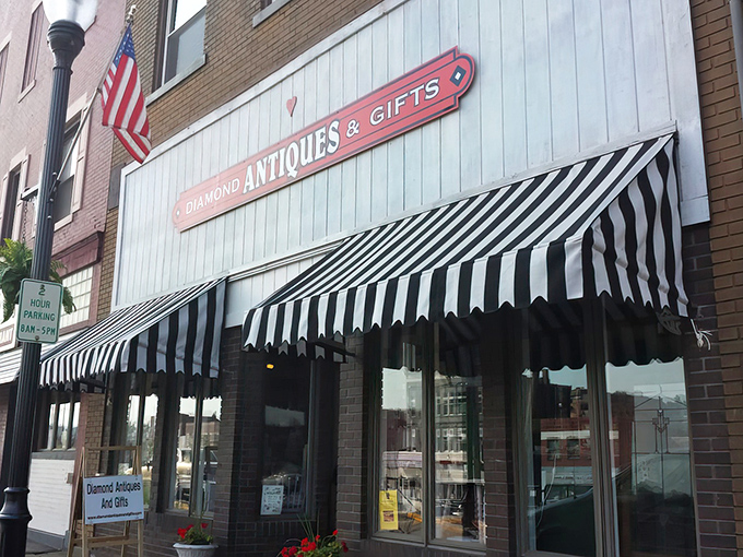 Diamond Antiques' distinctive black and white awnings signal this isn't your average flea market&mdash;it's a curated treasure trove.