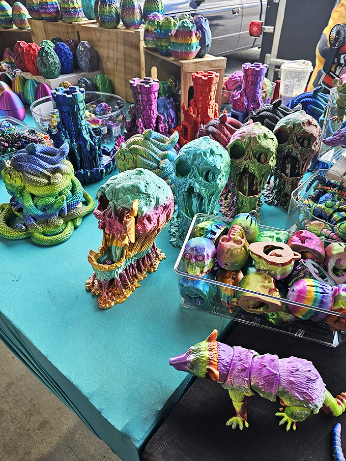 Colorful skull art and fantastical creatures transform one vendor's table into a psychedelic wonderland that would make Tim Burton feel right at home.