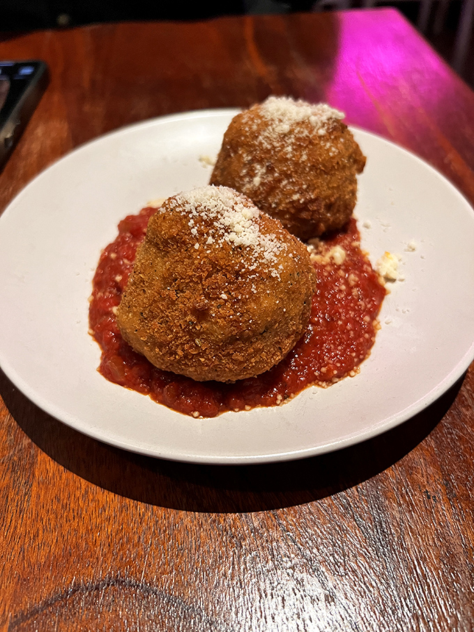 These vegan meatballs sitting in a pool of marinara look so authentic, they could fool an Italian grandmother. Almost.