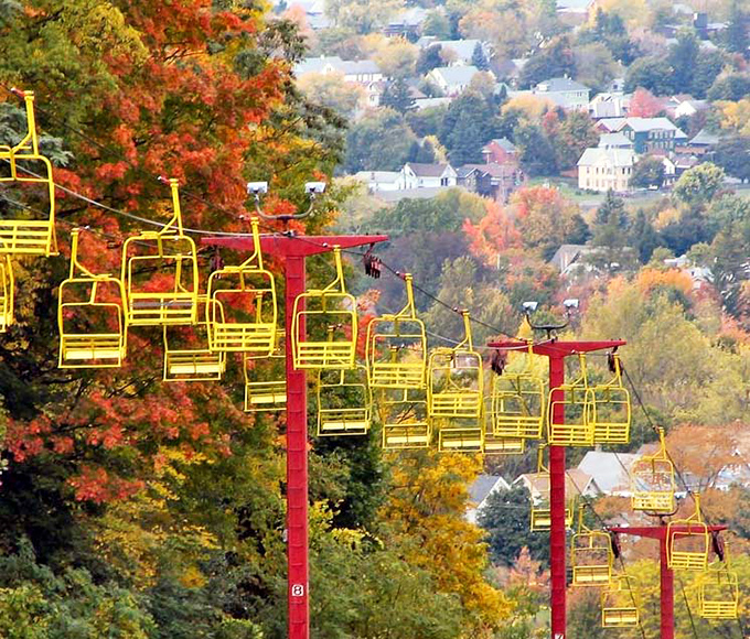 The Mohawk River creates nature's perfect boundary for riverside camping, where "waterfront property" comes with an affordable daily rate and sunset views included. 