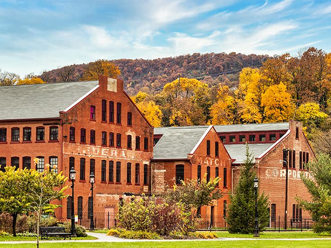 Fall foliage frames historic brick buildings like nature's own Instagram filter&mdash;no technology required for this kind of perfect lighting.