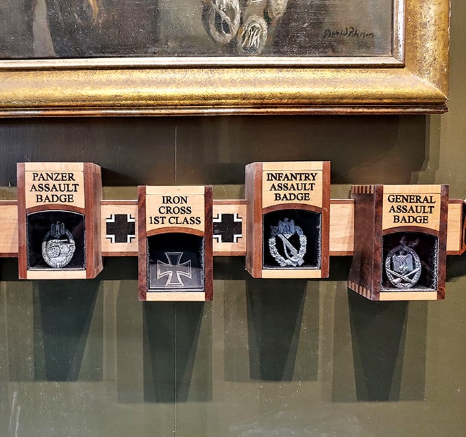 Military decorations tell stories of valor and achievement. These German and Allied badges represent the human element behind the machinery of war.