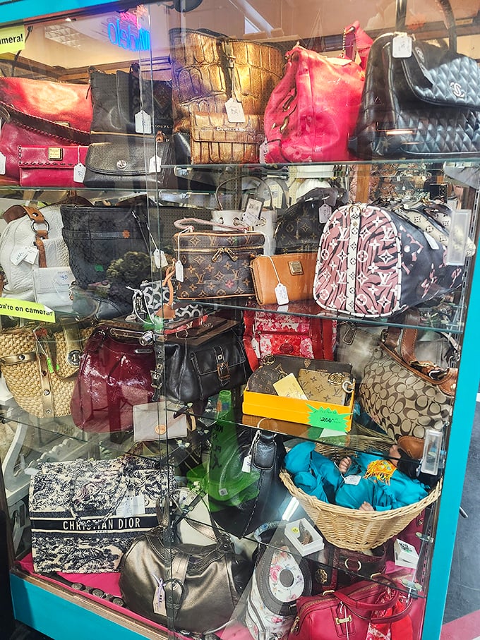 Handbag heaven or purse purgatory? Designer dreams and vintage varieties hang together in democratic fashion, waiting for their next shoulder.