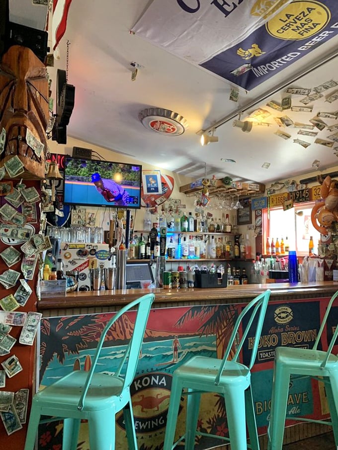 Dollar bills and beach-themed decor create that "vacation-meets-hometown" vibe that makes every visit feel both exotic and familiar.