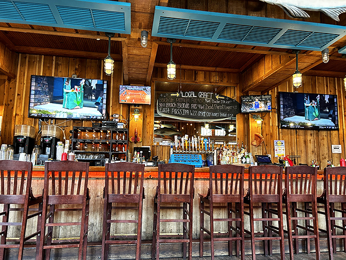 The bar isn't just serving drinks&mdash;it's serving possibilities. Those blue ceiling panels add a touch of sky even when you're inside.