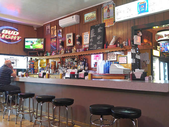 Bar seating offers front-row views of the action&mdash;where cold beers are poured and locals exchange the kind of banter that's been perfected over decades. 