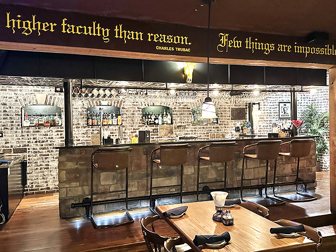 The bar area combines brick, wood, and wisdom &ndash; serving philosophy with your bourbon in an atmosphere that encourages lingering conversations. 