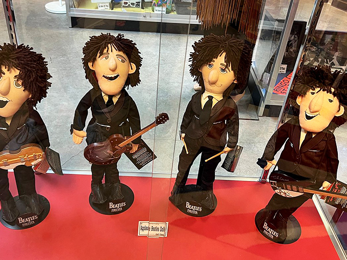 These whimsical Beatles dolls capture the band's playful spirit. With their exaggerated features and perfect miniature instruments, they're absolutely fab!