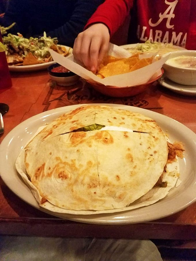 This quesadilla isn't playing around&mdash;it's a serious commitment to cheese and filling that requires both hands and your undivided attention.