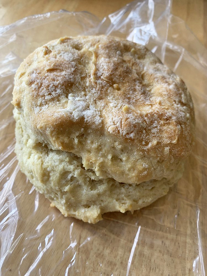 The humble biscuit, elevated to art form. This cloud-like creation has the perfect balance of flaky exterior and buttery, tender interior.