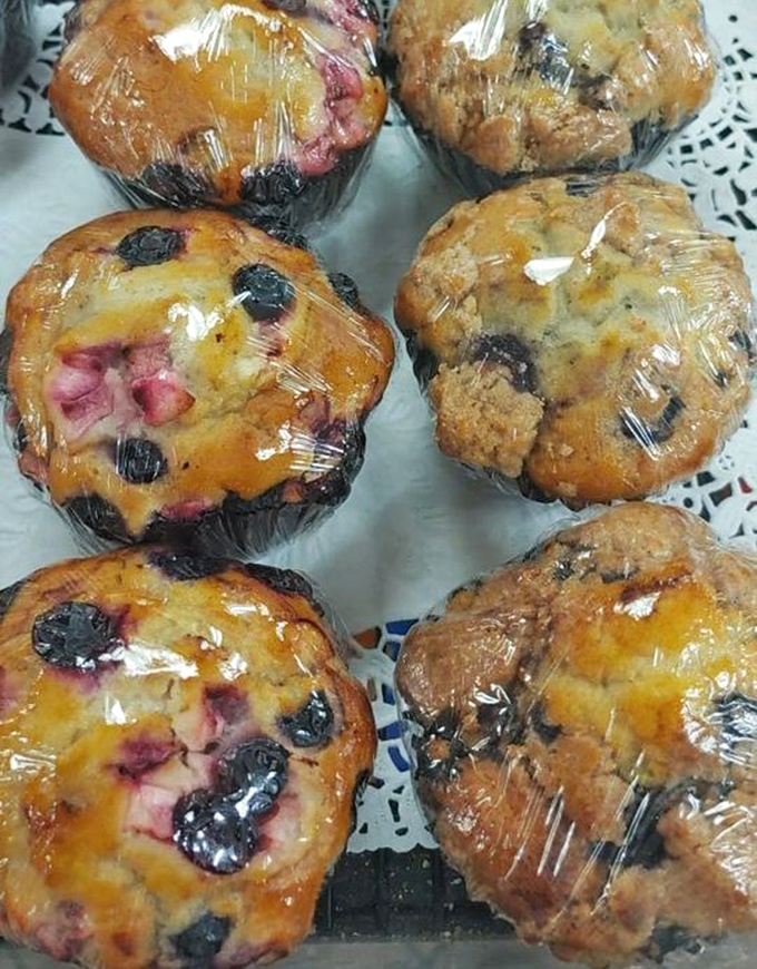 Blueberry muffins that look like they jumped straight out of a Norman Rockwell painting of the ideal American breakfast.