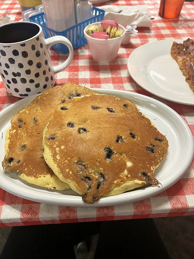 Blueberry pancakes that strike the perfect balance between fluffy and substantial&mdash;each purple burst a tiny reminder that nature's candy belongs at breakfast.