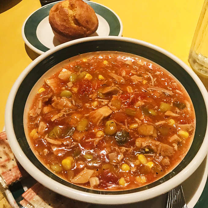 Brunswick stew that's been simmering since before your last relationship ended. The cornbread muffin is just waiting for its diving moment.