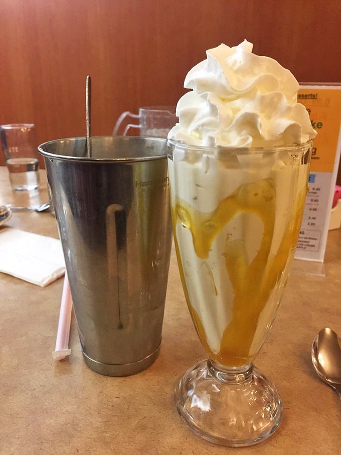 Butterscotch shake architecture that defies gravity and common sense. Dessert engineering at its finest.