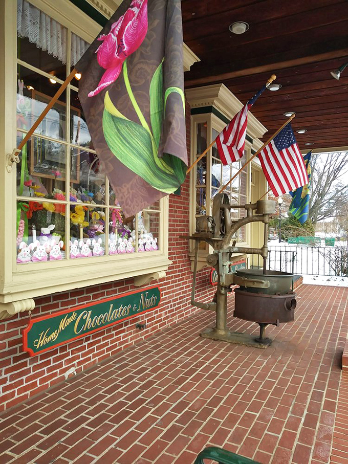 The front porch &ndash; where vintage charm meets homemade chocolate promises, complete with an antique kettle that's seen sweeter days.