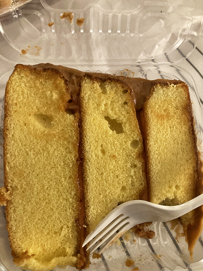 Caramel cake slices so moist and rich they make you wonder if dessert should actually come before the chicken. (Spoiler: get both.)