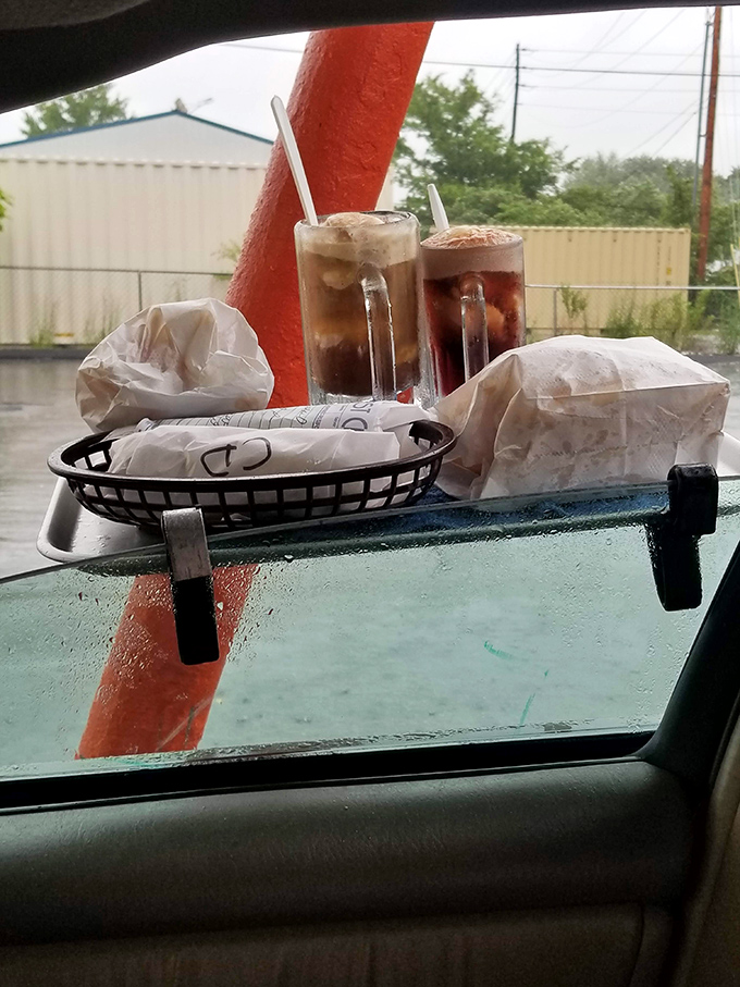The car-hop tray: ingeniously simple and simply ingenious. Your car becomes the best restaurant table in town.